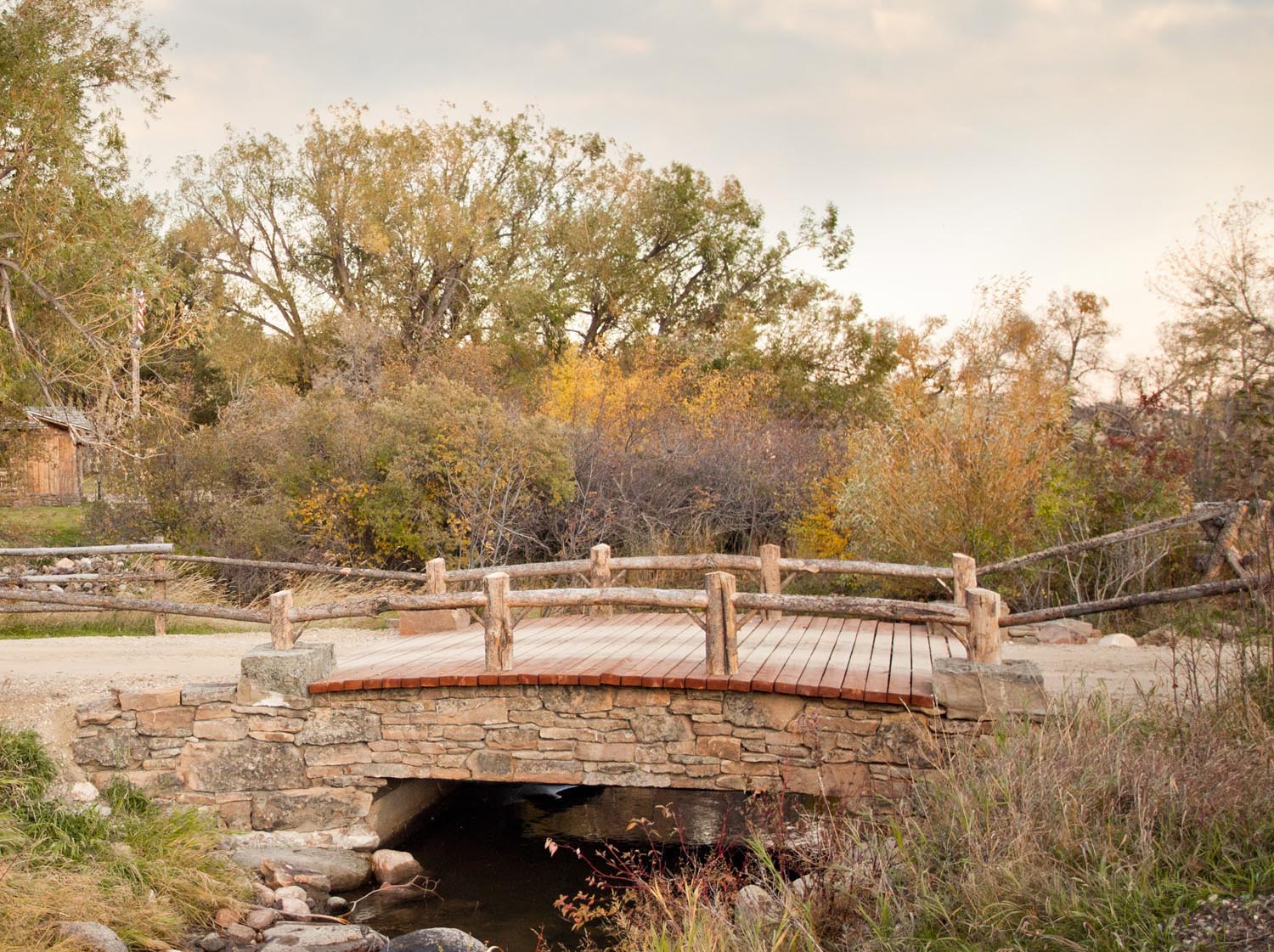 5 Hand-scribed Log & Moss Rock Bridge – Heritage Woodworks